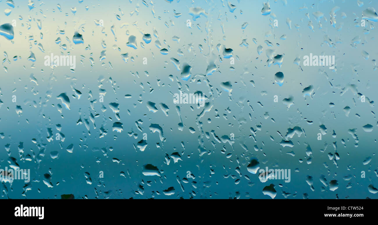 Raindrops on window glass Stock Photo - Alamy
