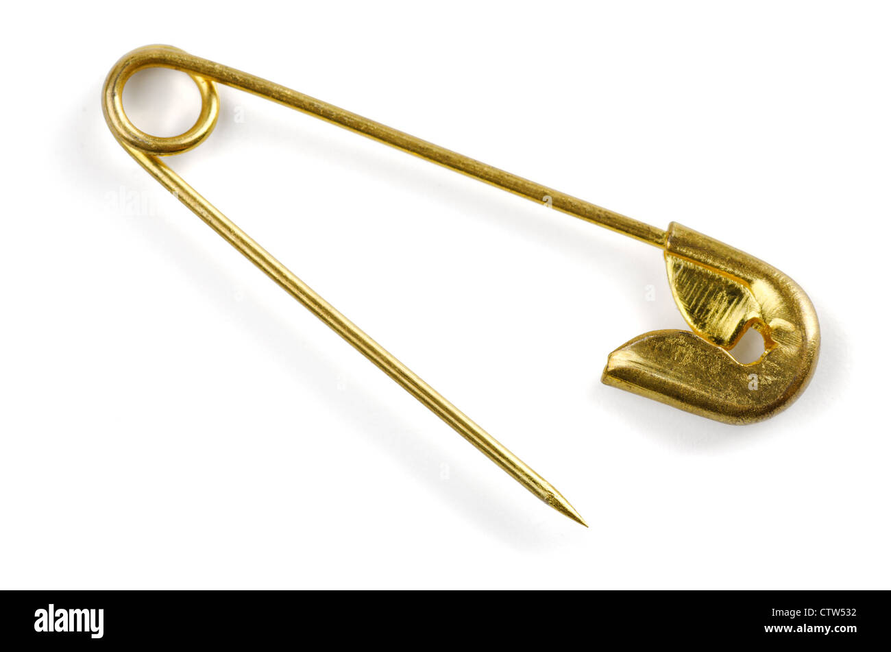 Golden open safety pin isolated on white Stock Photo - Alamy