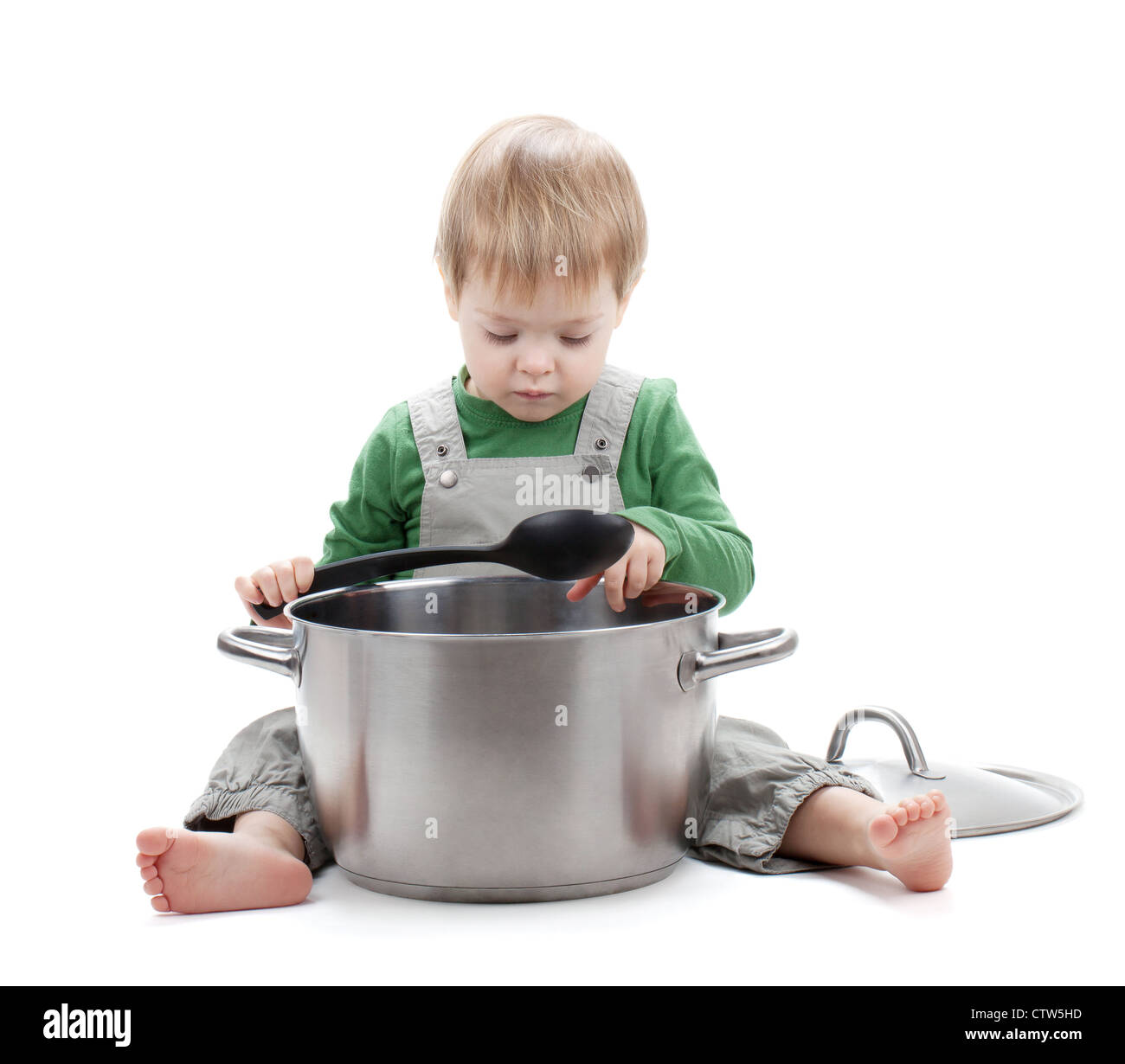 Baby cooking. Isolated on white background Stock Photo - Alamy