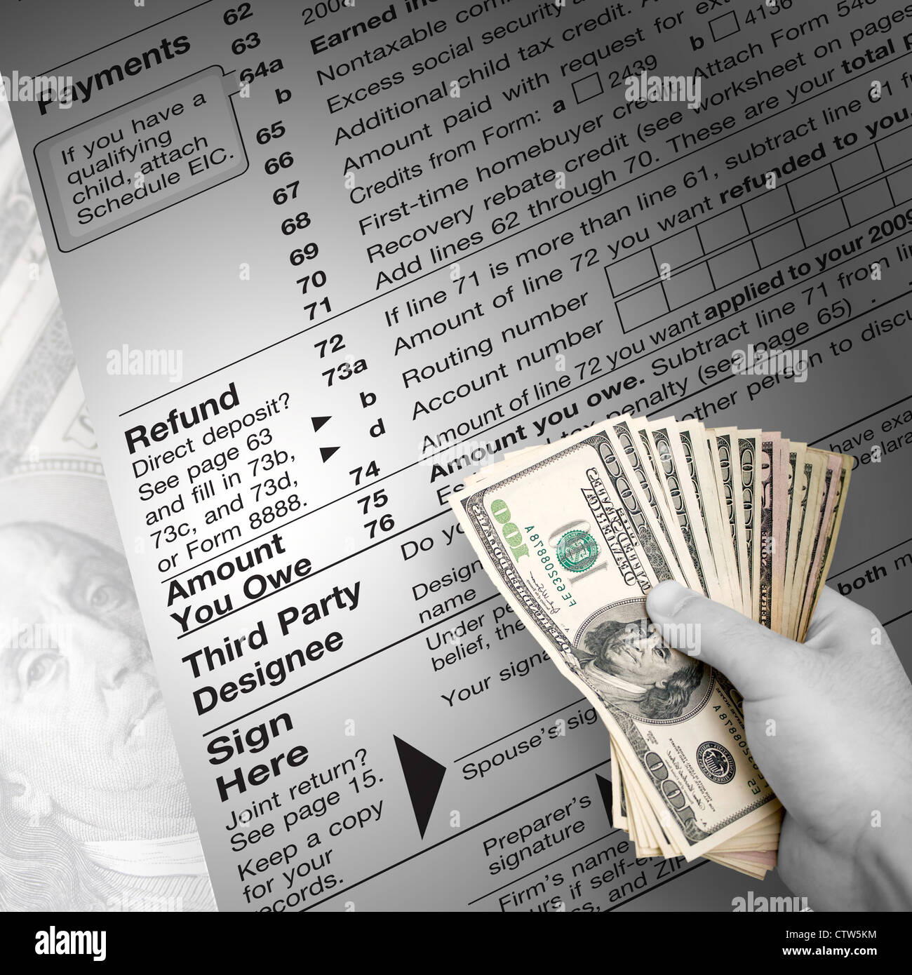 A tax time themed montage for US taxpayers with a hand full of money ...