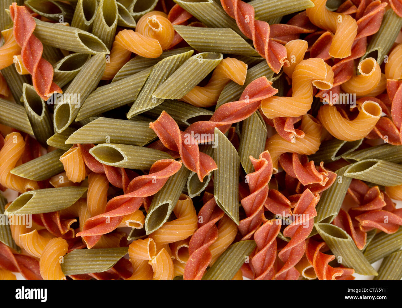 Colored pasta food background Stock Photo - Alamy