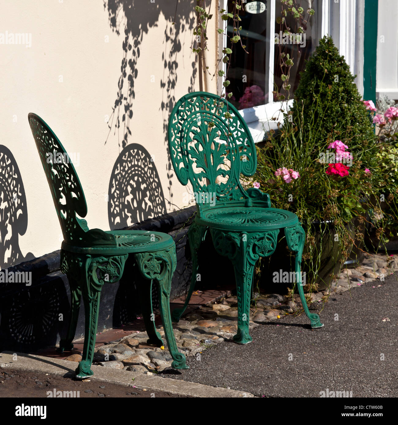 Chairs on pavement hi-res stock photography and images - Alamy