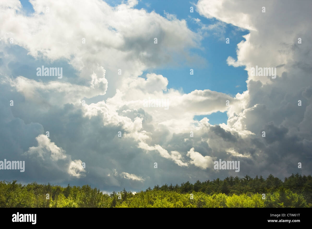 Blue sky and building storm clouds Stock Photo - Alamy