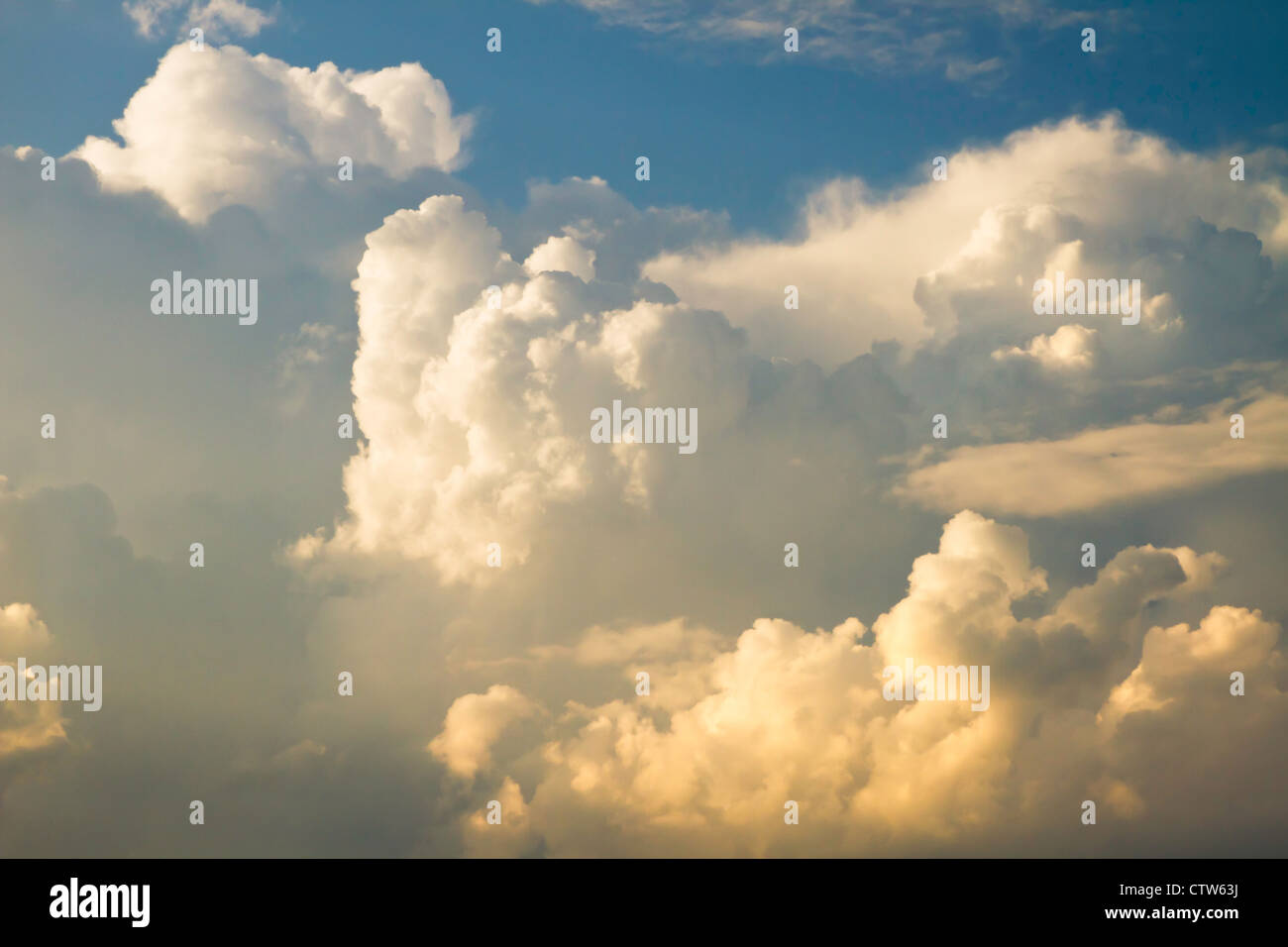 Blue sky and building storm clouds Stock Photo - Alamy