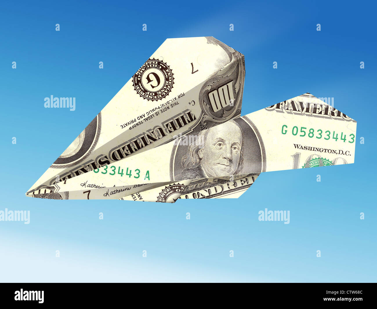 Dollar banknote airplane on blue sky Stock Photo - Alamy