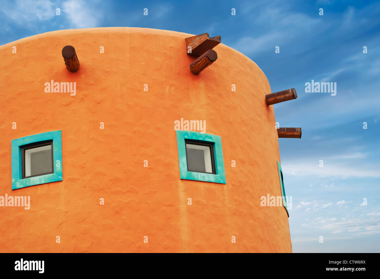 Native American style building detail in vibrant orange and blue colors ...