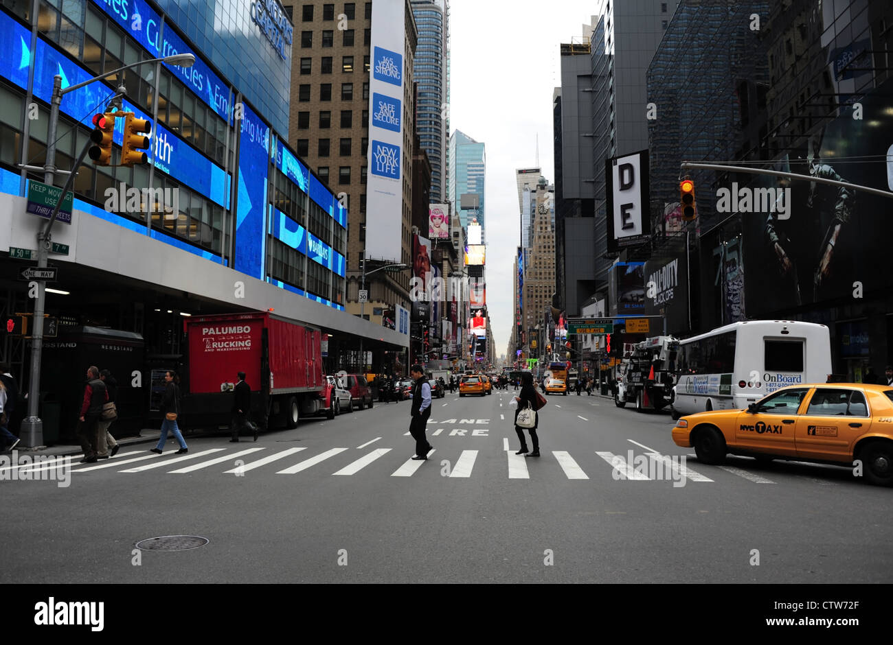 Vehicles 1 yellow taxi turning 7th avenue right foreground hi-res stock ...