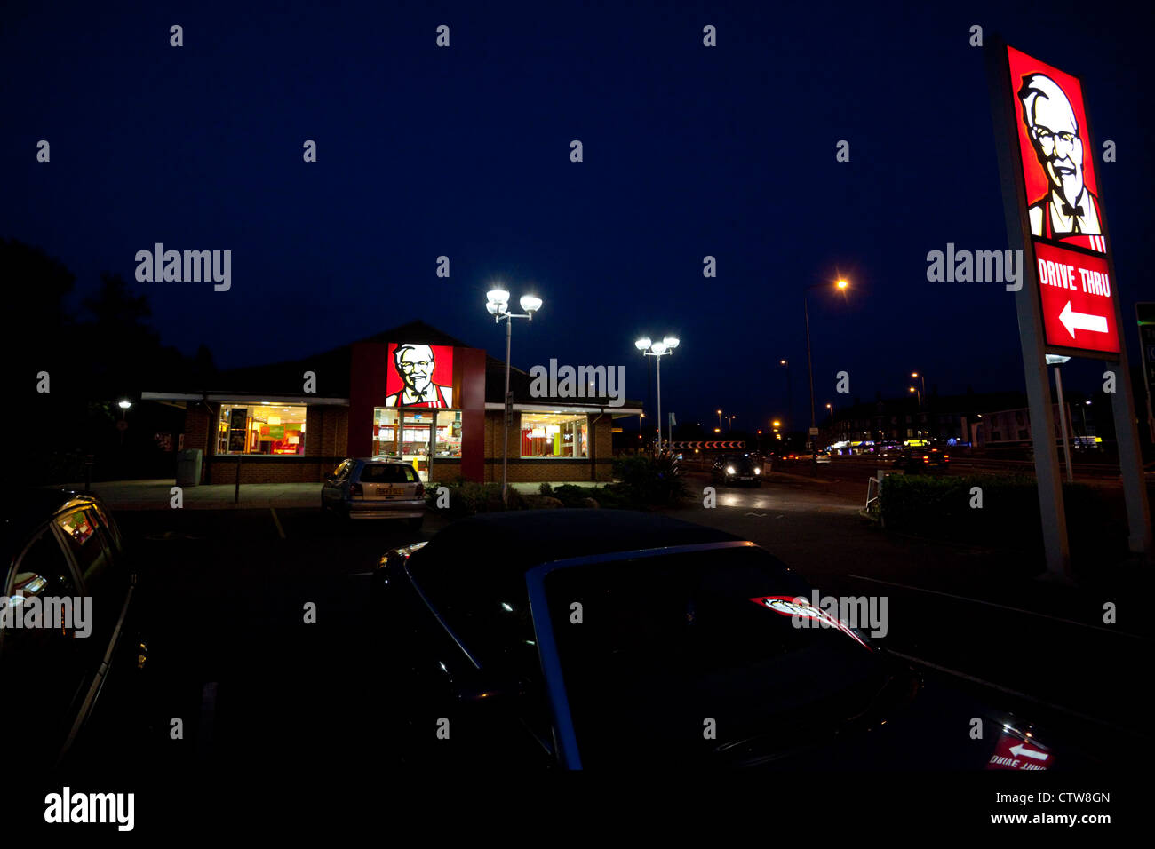 KFC restaurant exterior at night, London, England, UK Stock Photo - Alamy