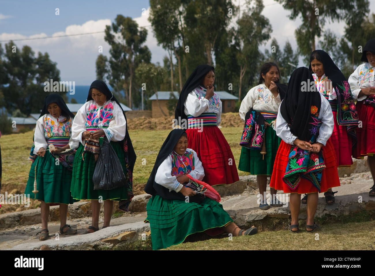 depicting indigenous people of Amantani, Lake Titicaca, Peru making and ...