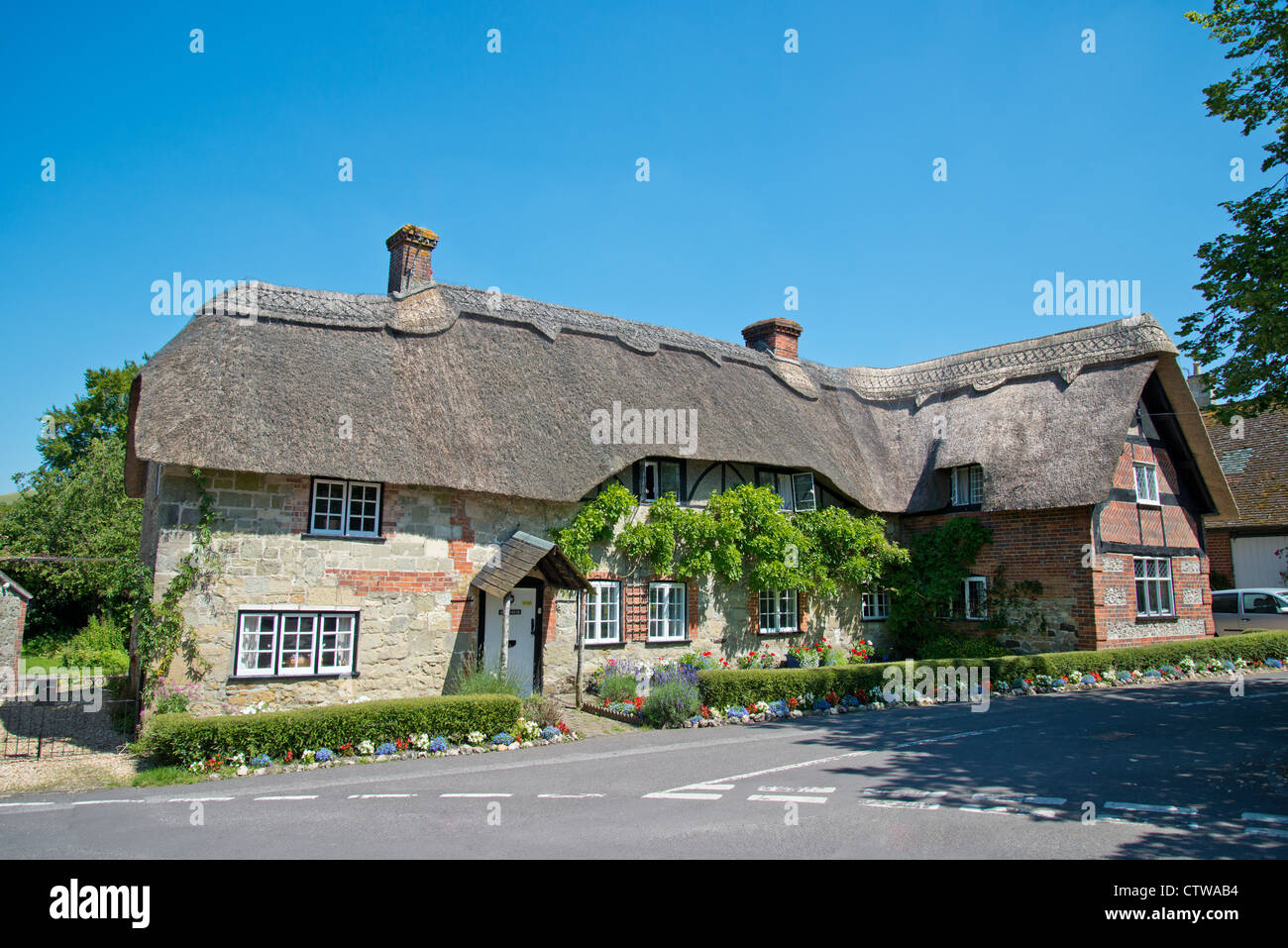Thatched cottage in Fontmell Magna, Dorset, England, United Kingdom ...