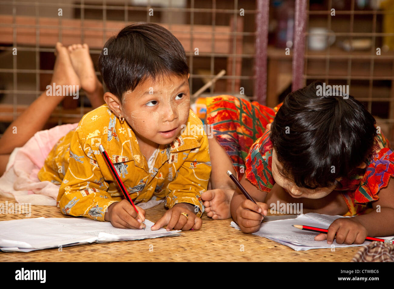 Myanmar, Burma. Bagan. Young Burmese Girls Writing in their Notebooks ...