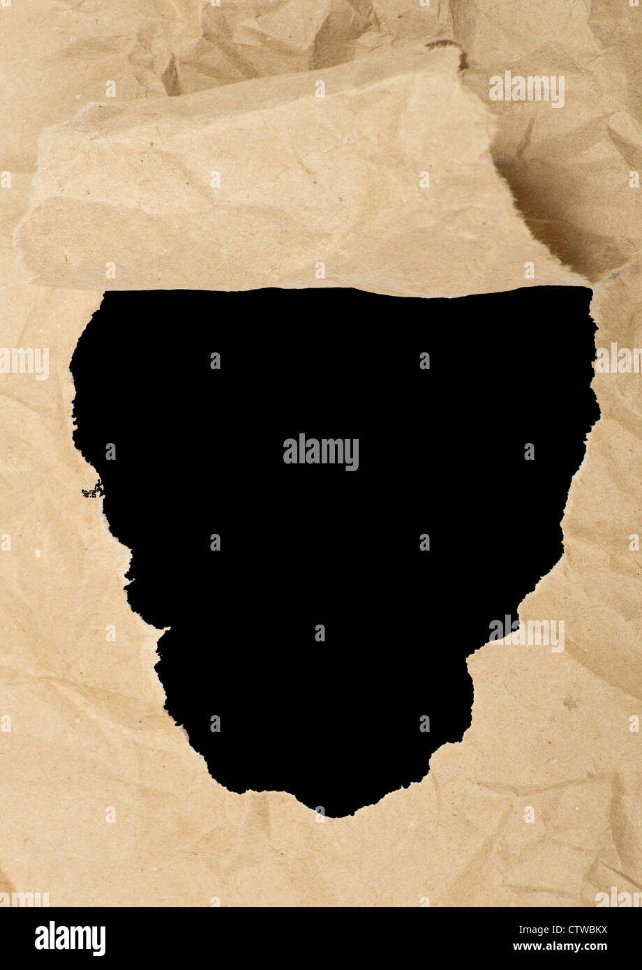 ripped white paper against a black background Stock Photo - Alamy