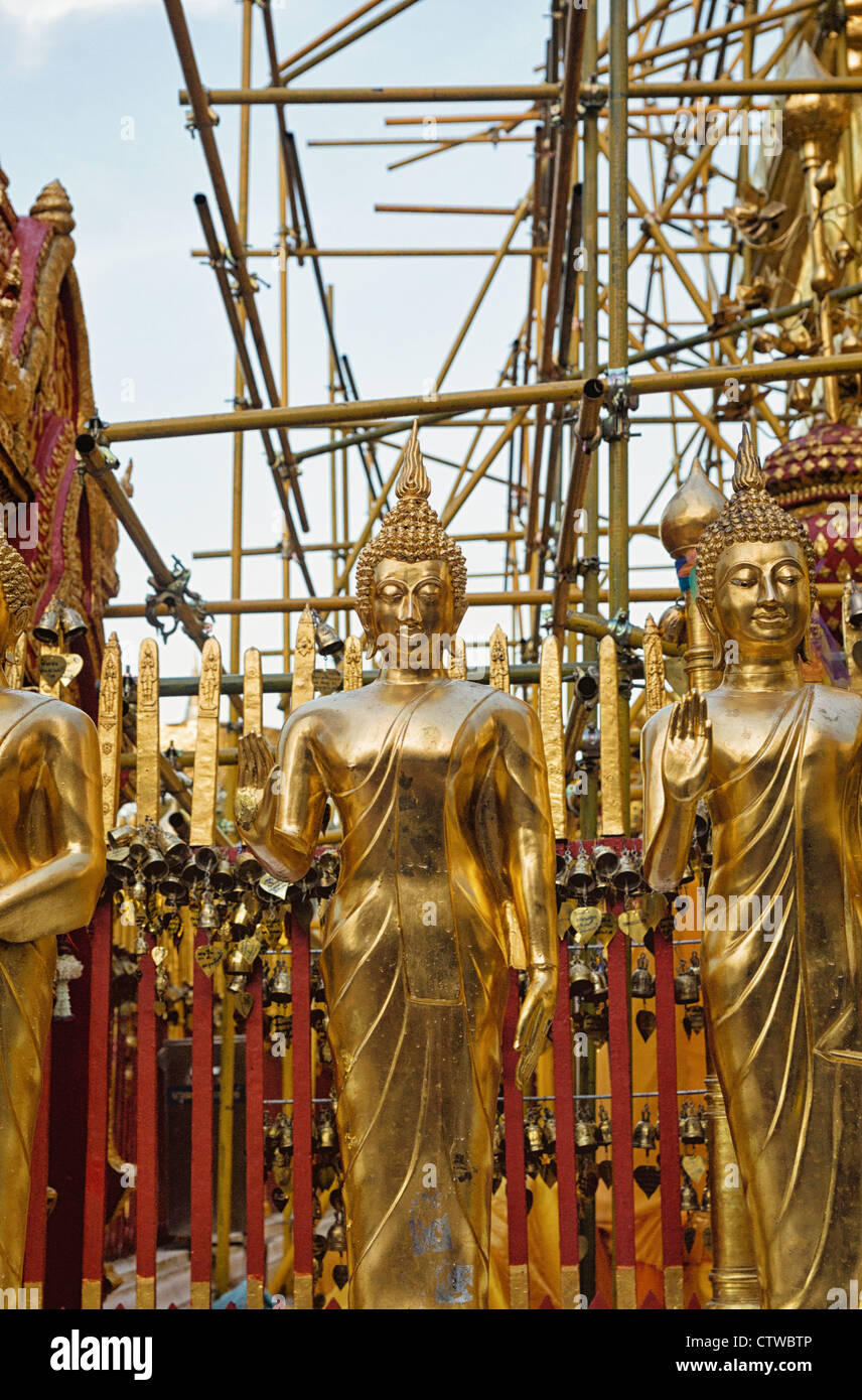 gold buddha images in front of golden temple being reconstructed Stock ...
