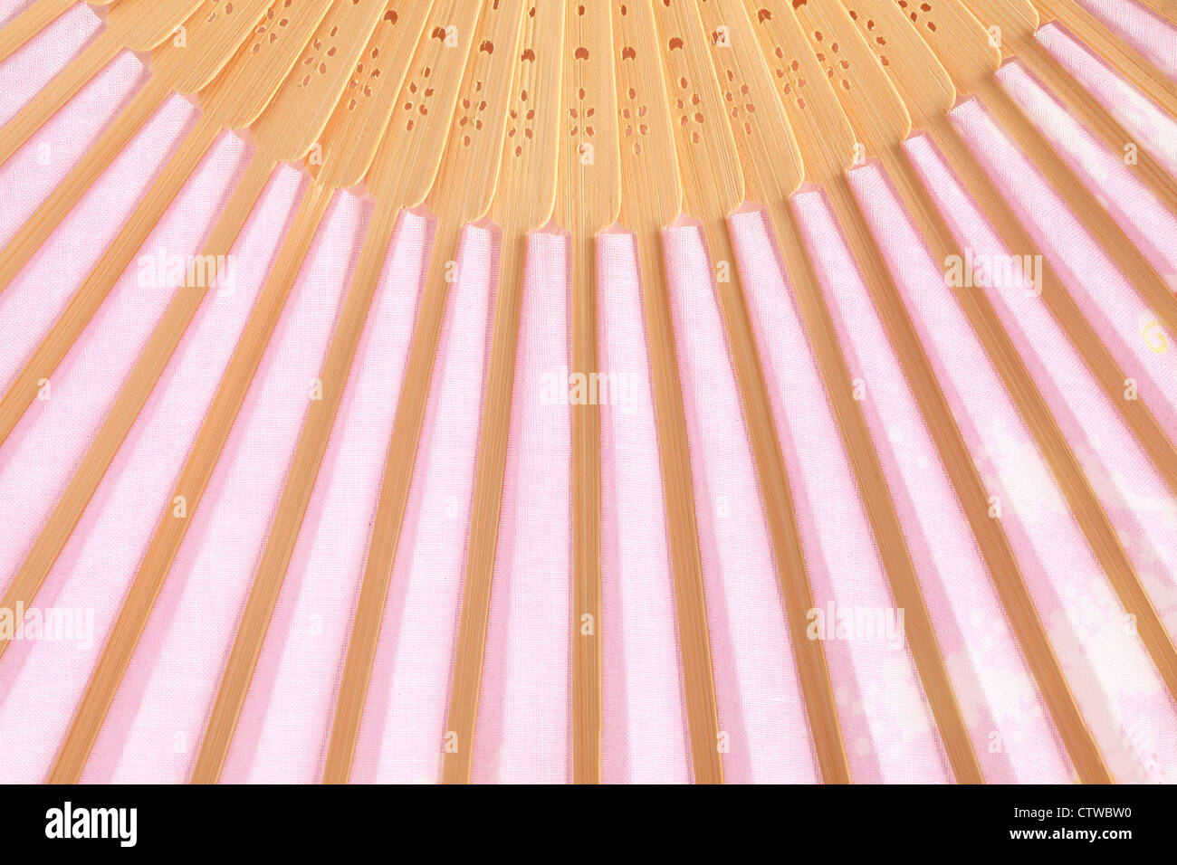 Pink opened fan as a background texture Stock Photo - Alamy