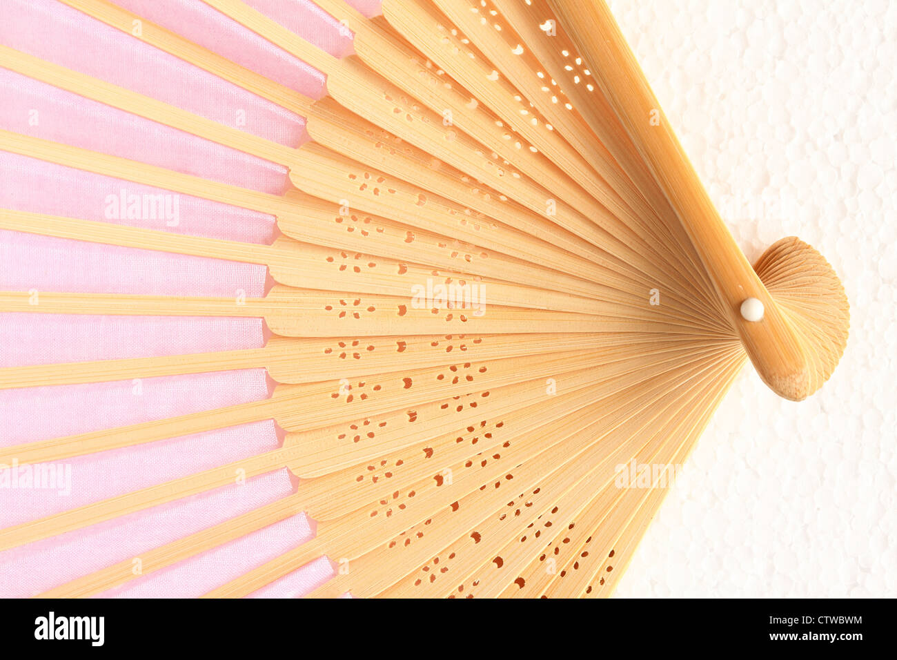 Pink opened fan as a background texture Stock Photo - Alamy