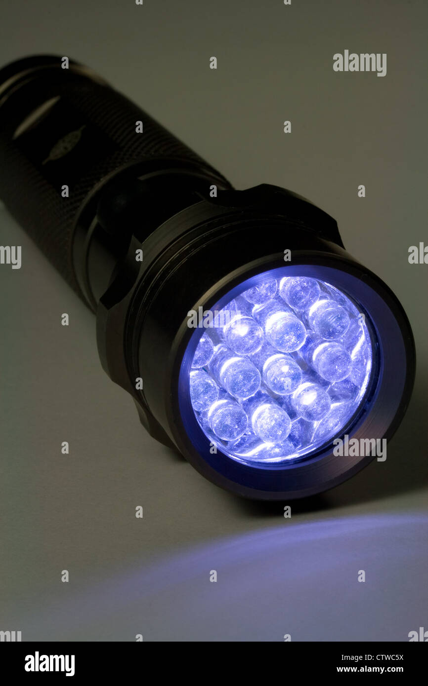 Modern LED Flashlight - Turned On (LED stands for Light Emitting Diode ...
