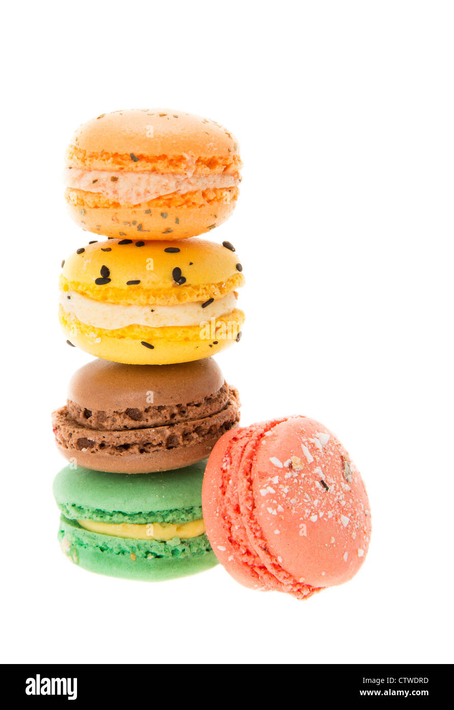 A stack of multi-coloured macaroons - studio shot with a white ...