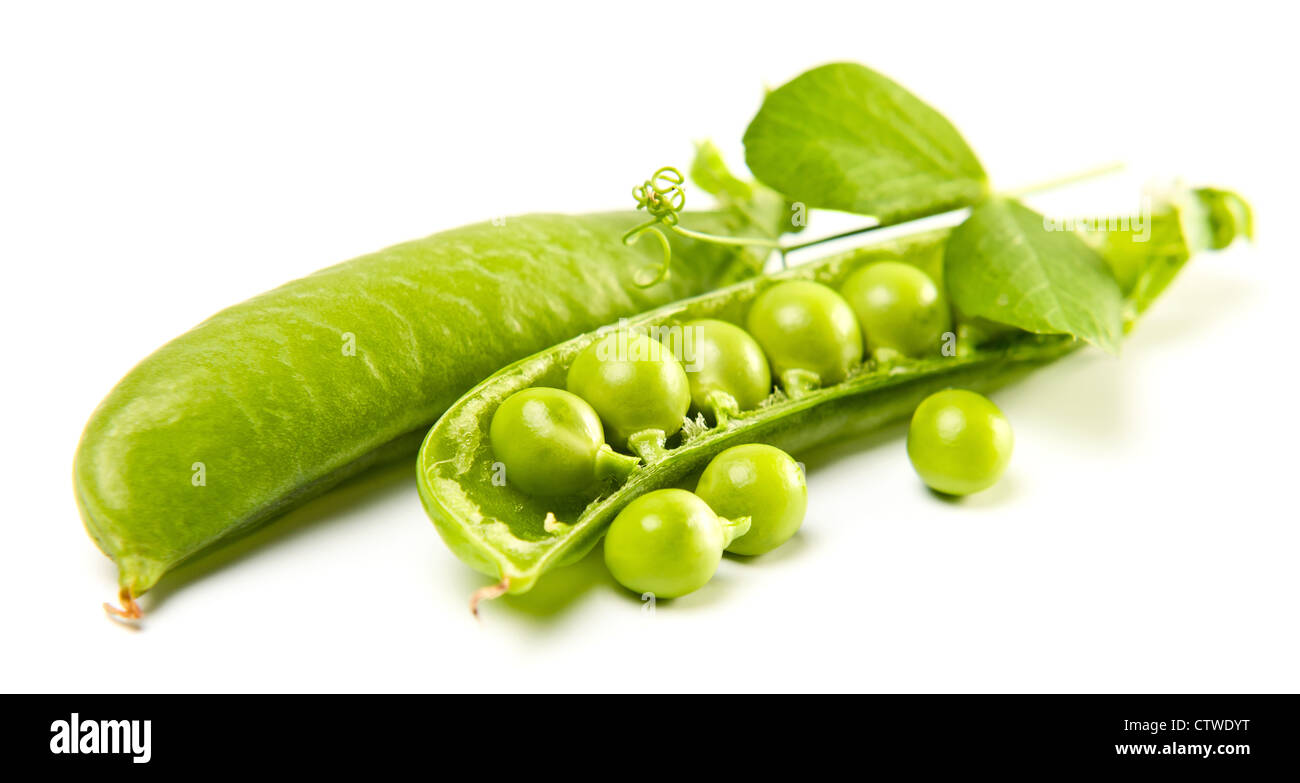 green peas isolated on a white background Stock Photo - Alamy