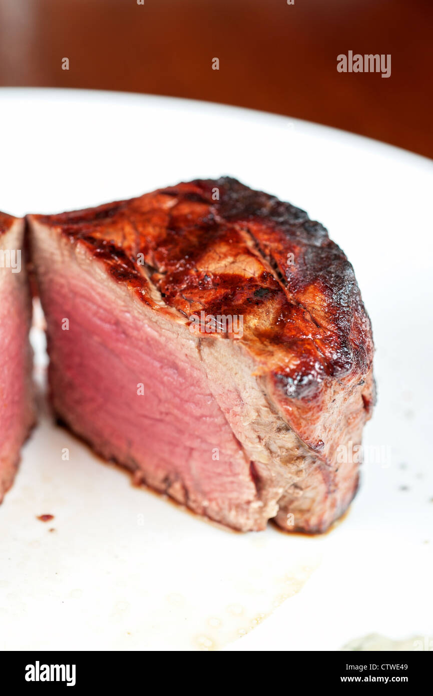 Filet mignon, char-grilled to medium rare Stock Photo - Alamy