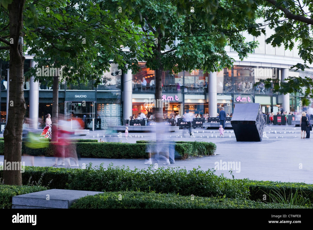 A summer scene at More London Estate a Foster and Partners development ...