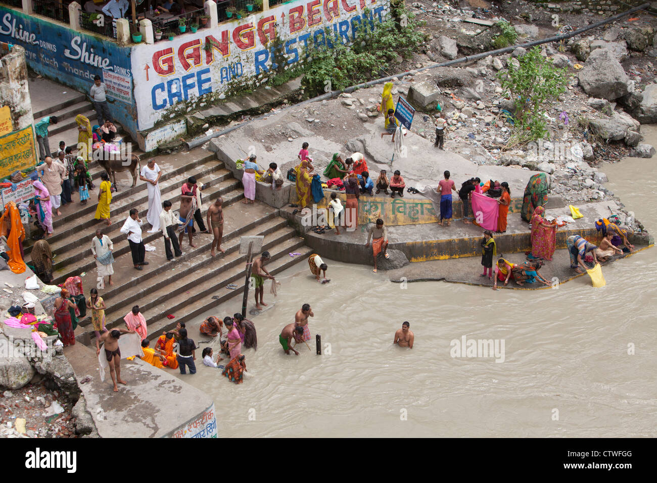 Indian people on the banks of the Ganges river Stock Photo - Alamy