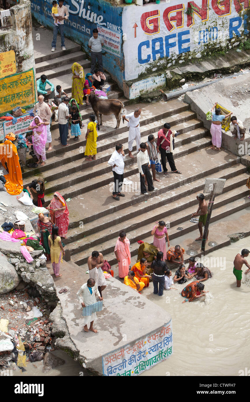 Indian people on the banks of the Ganges river Stock Photo - Alamy
