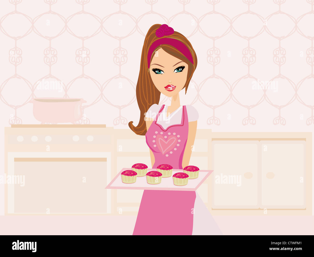 Beautiful lady cooking cakes Stock Photo - Alamy