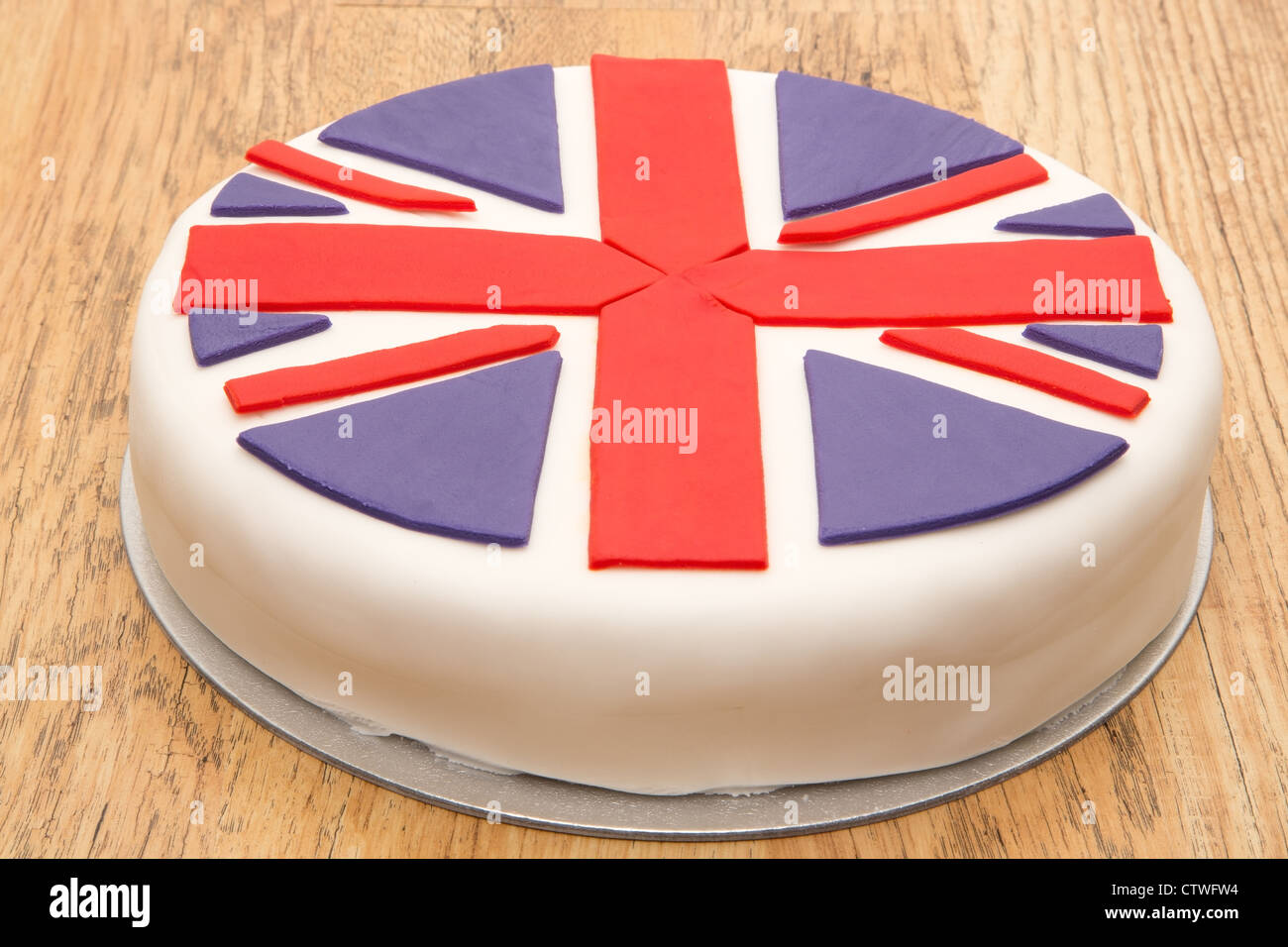 Victoria sponge cake with UK flag icing decoration - studio shot Stock ...