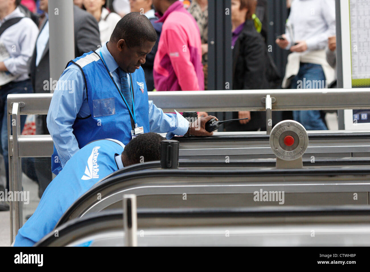 Network rail workers fix an escalator in London Bridge Station Stock ...