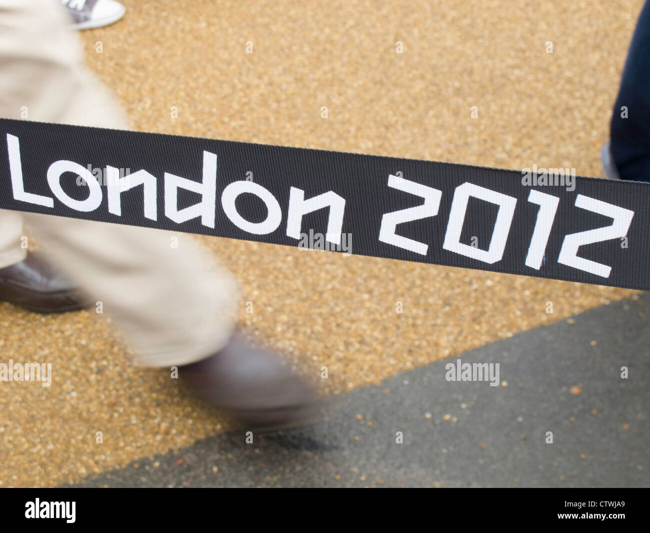 London 2012 guide ribbon with blurred foot signifying movement Stock ...