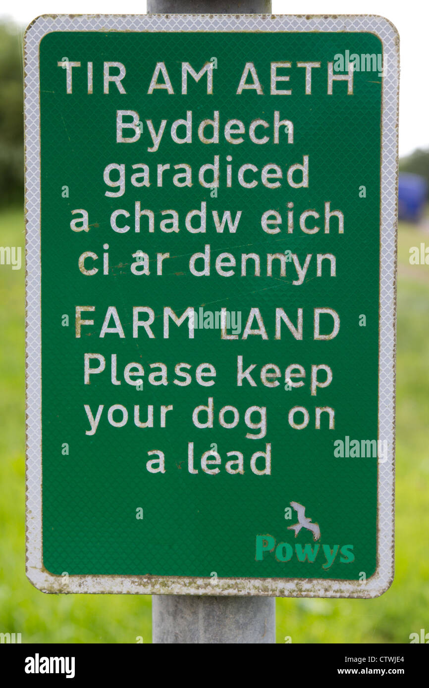 Polite bilingual, Welsh - English notice to dog owners to keep their ...