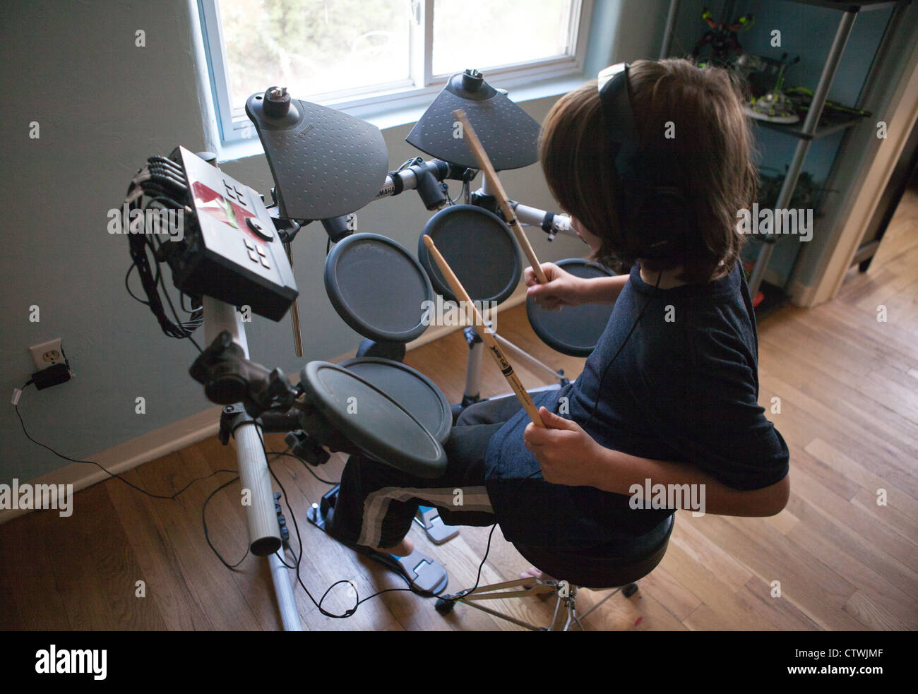 Child playing percussion hi-res stock photography and images - Alamy