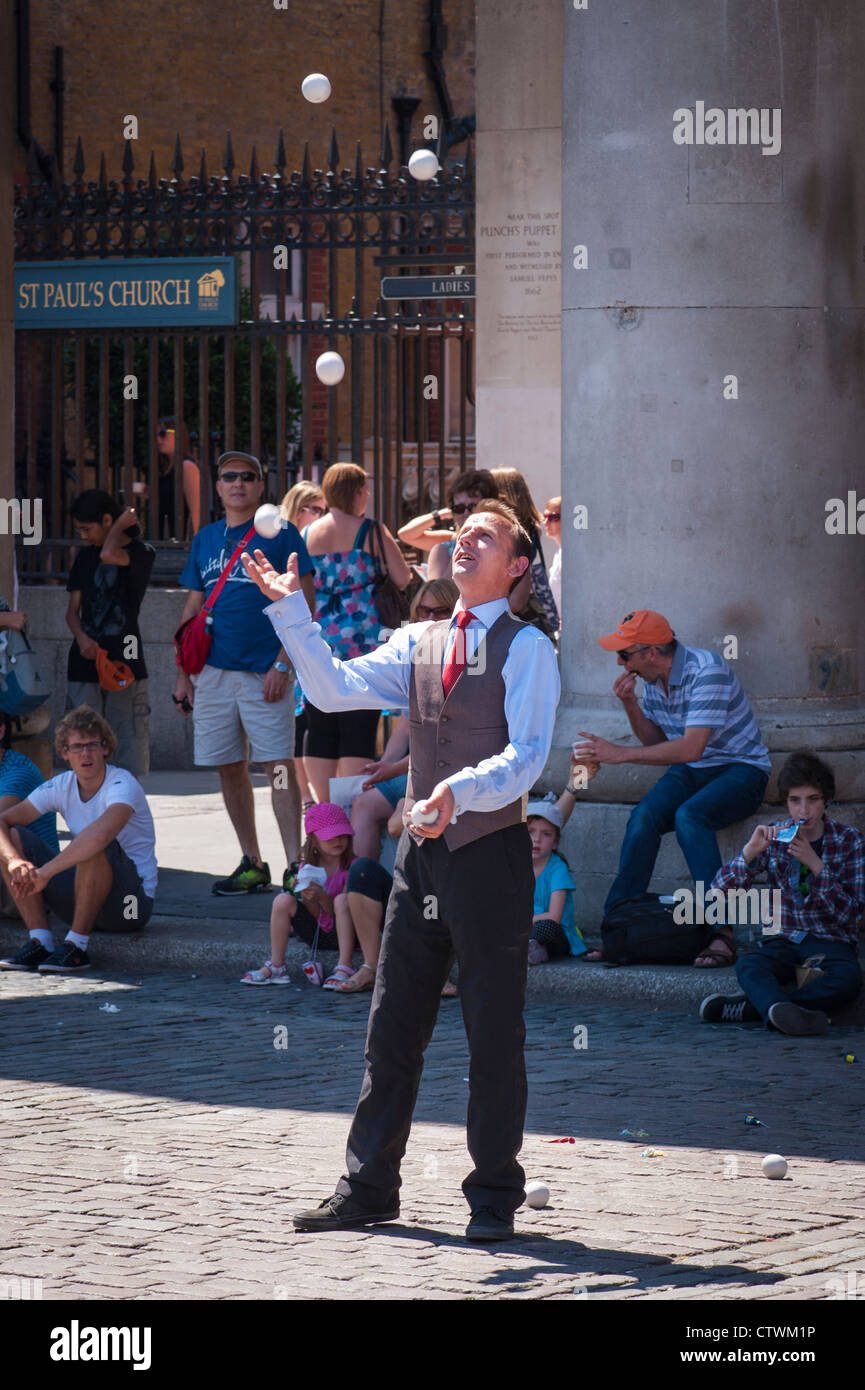 London Covent Gardens Market by St Paul's Church street entertainer ...