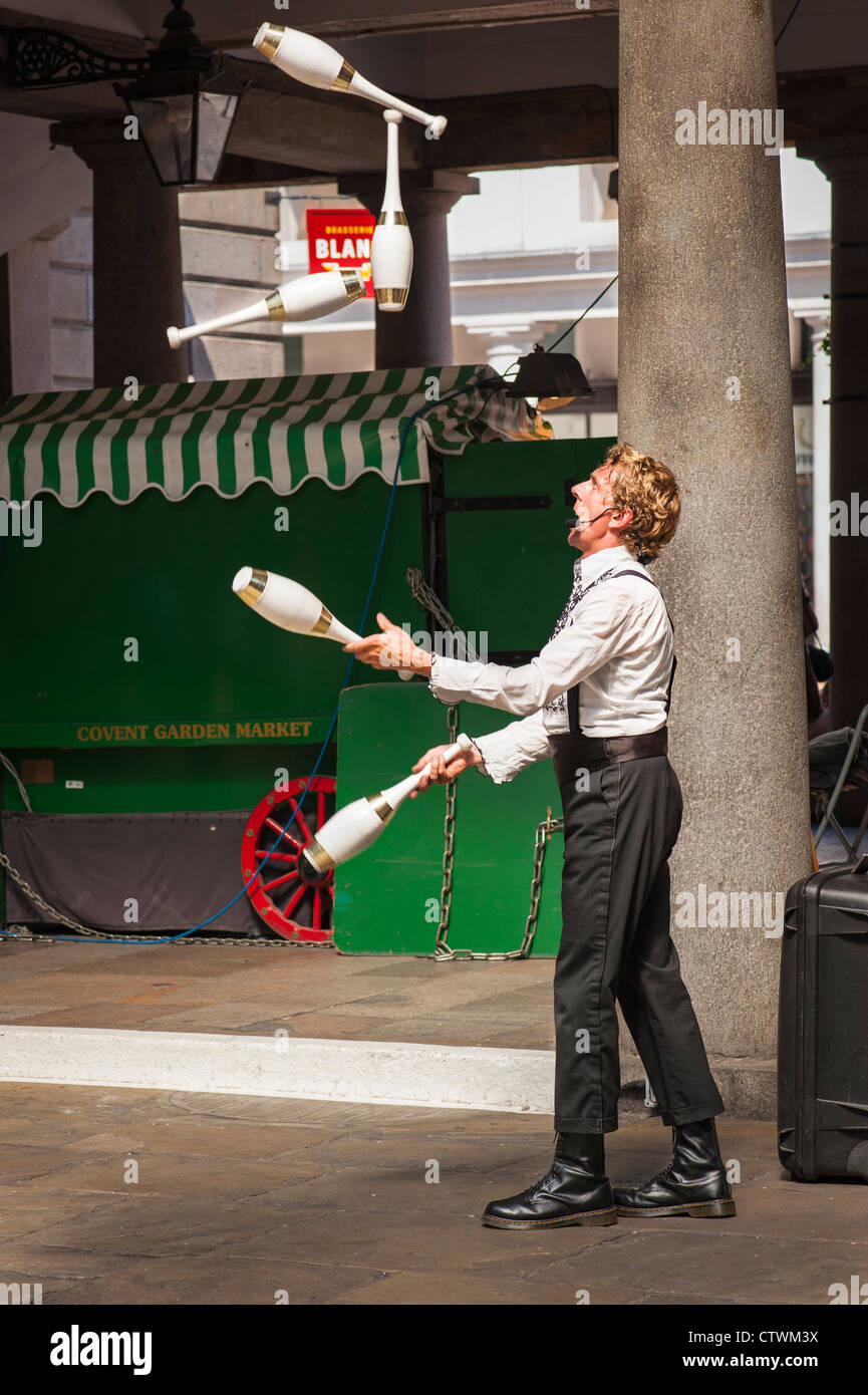 London Covent Gardens Market juggler performer entertainer artist ...