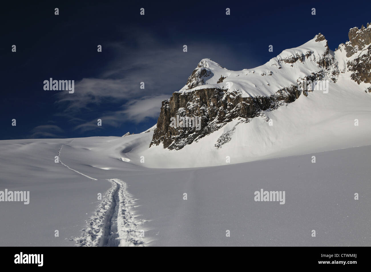 Footprints from tour ski on Clariden firn in Switzerland Stock Photo ...