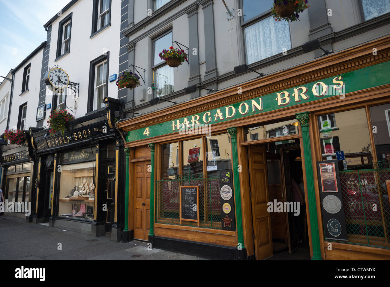 Pub and character shop fronts on O'Connell Street, Sligo town, Sligo ...