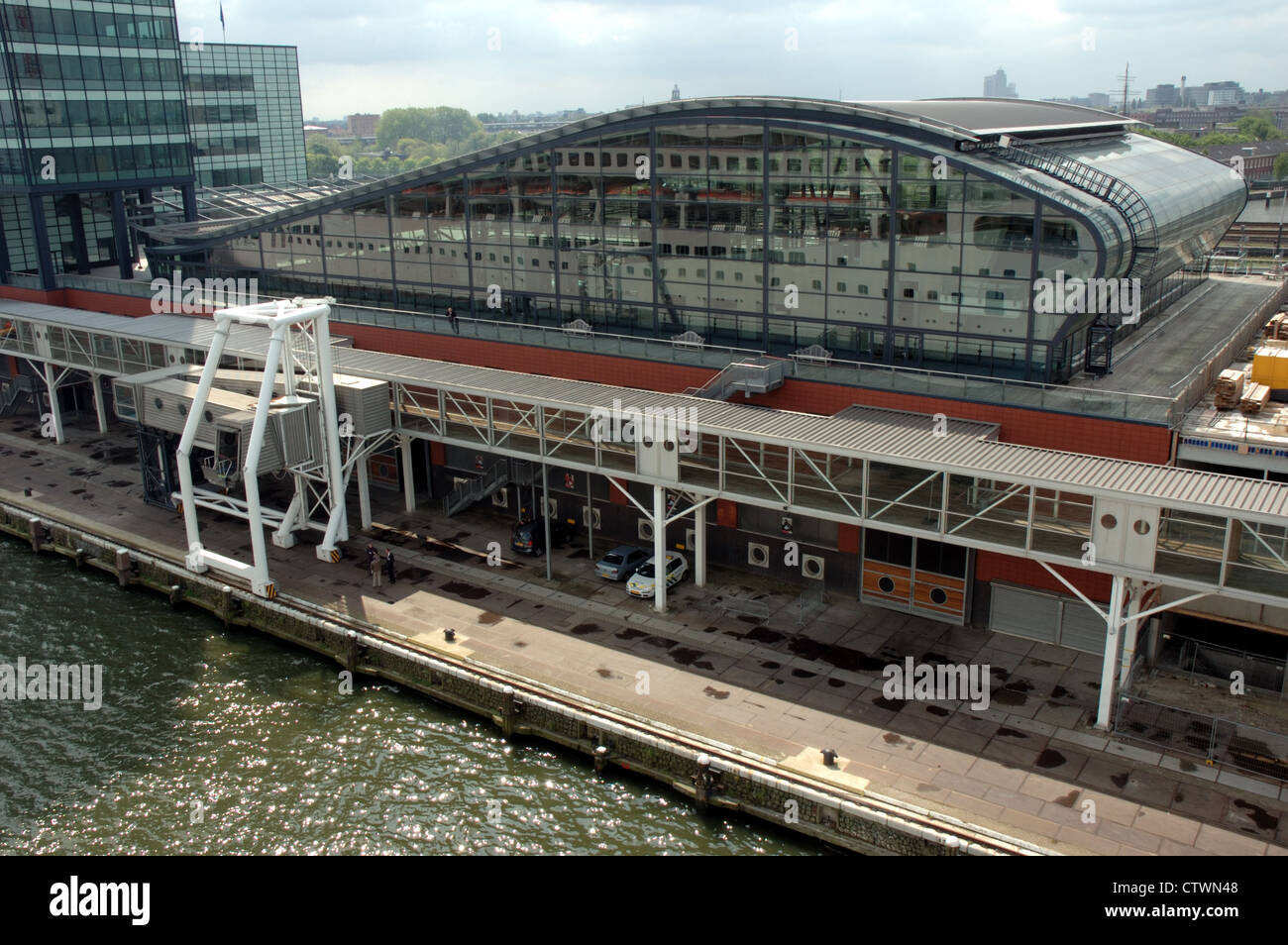 Cruise ship Aurora reflected in the windows of the cruise terminal ...