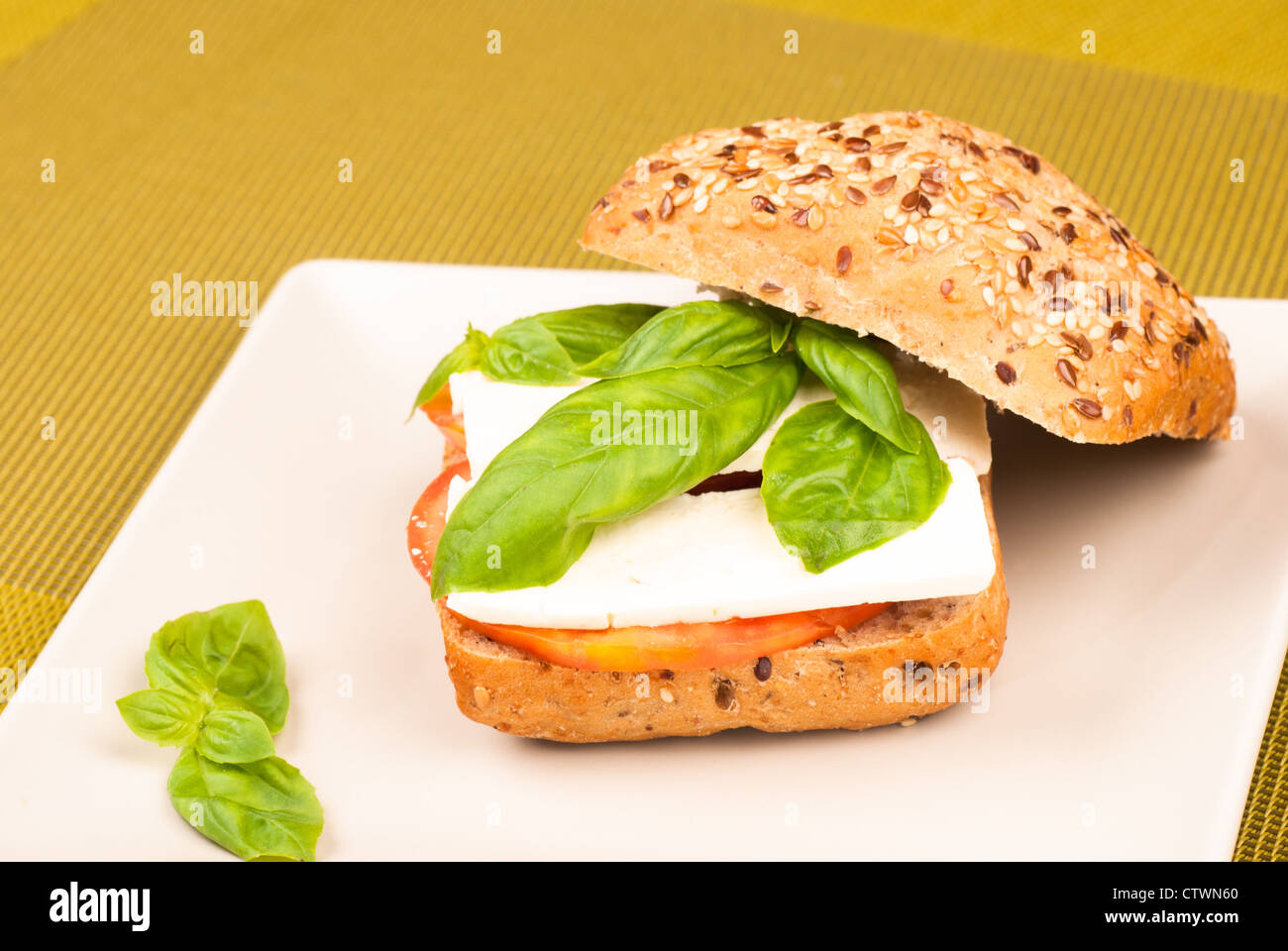 Feta cheese sandwich topped with sesame and flax seeds Stock Photo - Alamy