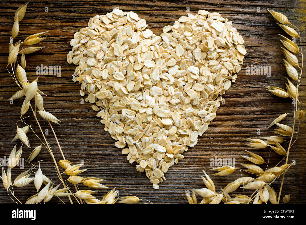 Heart shape made from oat flakes Stock Photo - Alamy