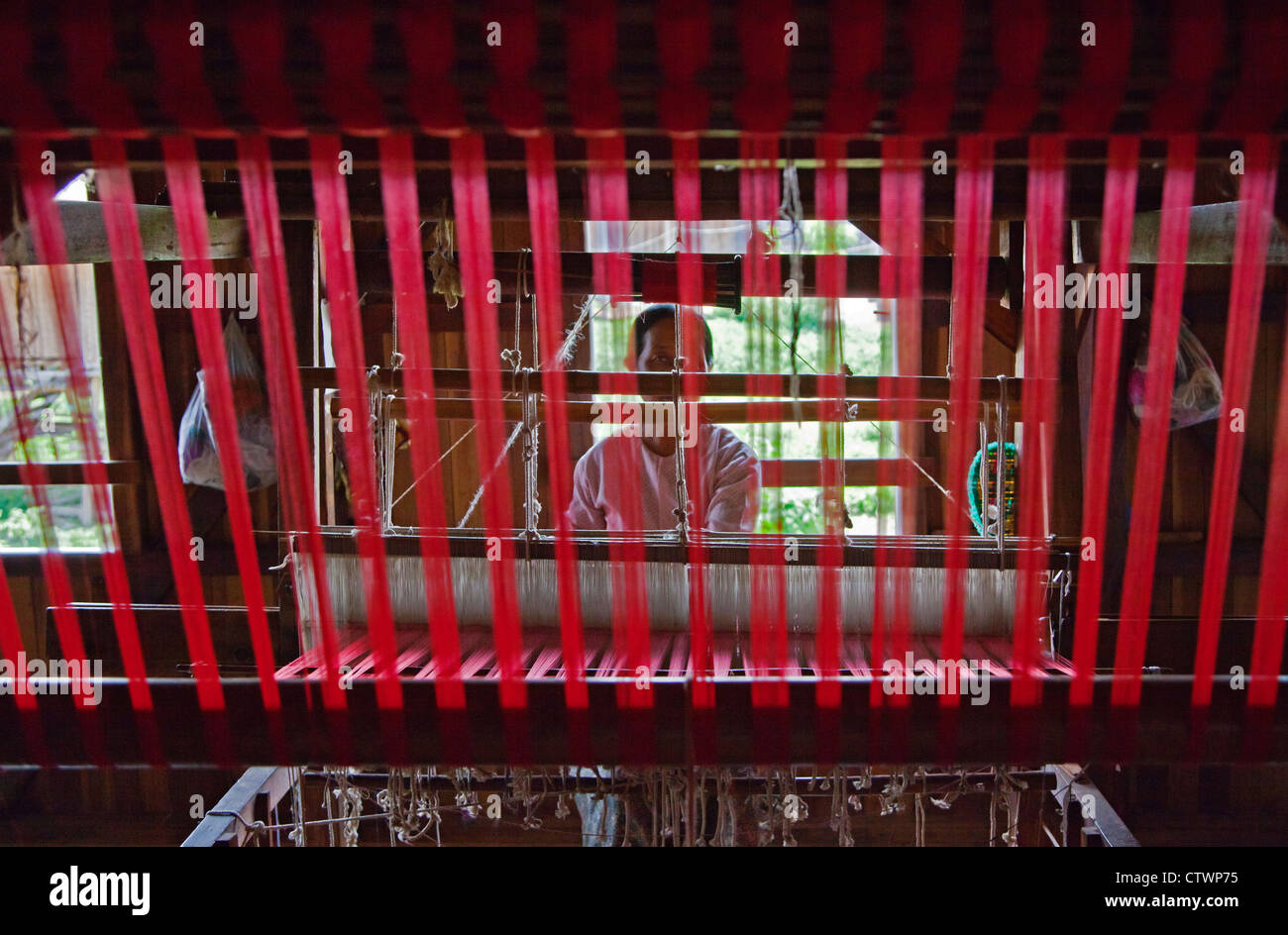 The weaving of LOTUS SILK fabric from the stalks of the lotus plant is ...