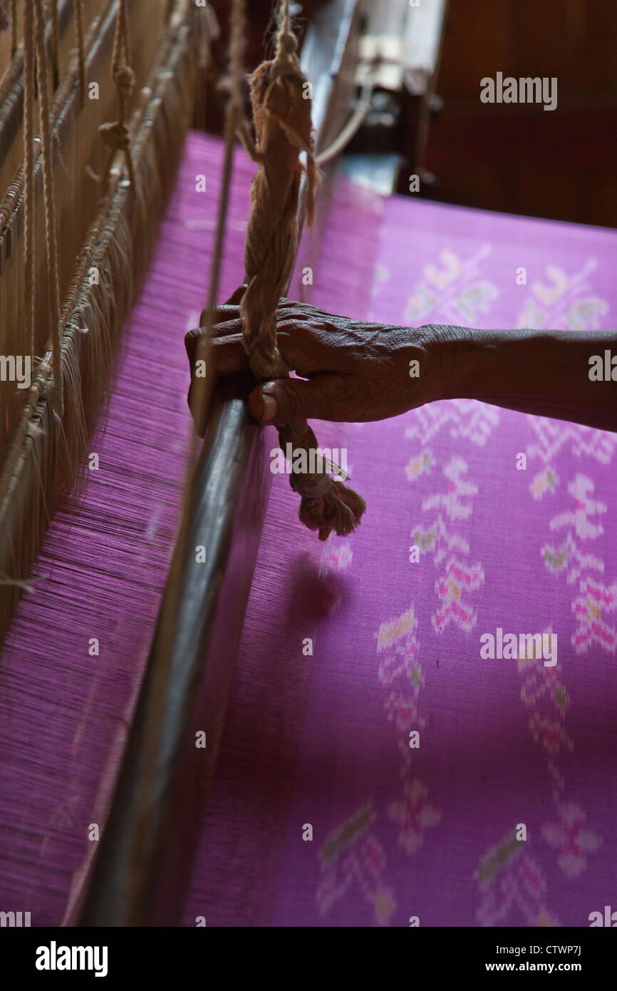 The weaving of LOTUS SILK fabric from the stalks of the lotus plant is ...