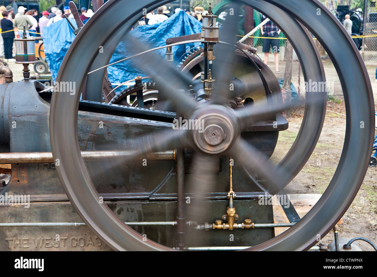 spinning drive shaft of antique engine Stock Photo - Alamy