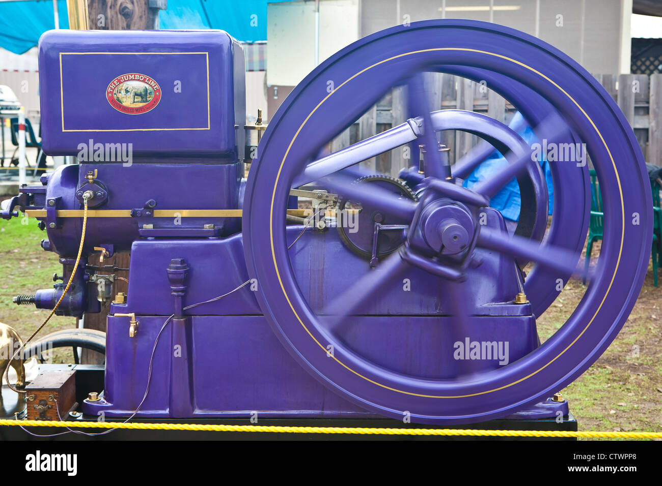 spinning drive shaft of antique engine Stock Photo - Alamy