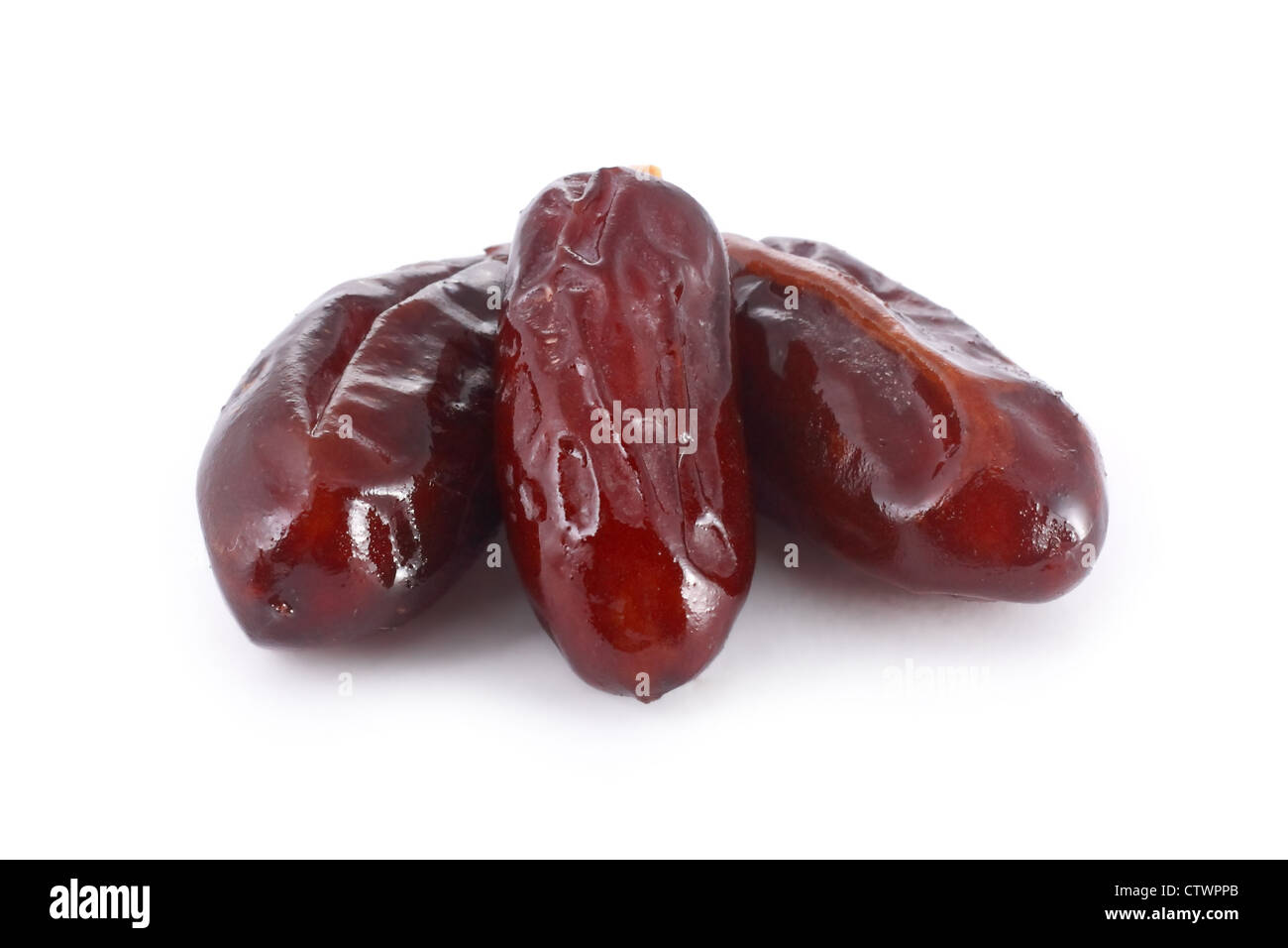 Three dates isolated on white background Stock Photo - Alamy