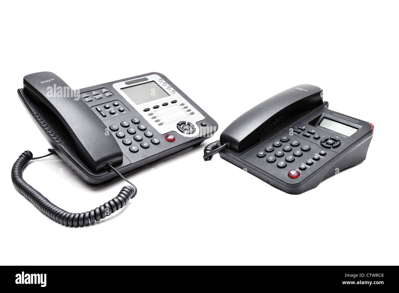 Two office phone isolated on white background Stock Photo - Alamy