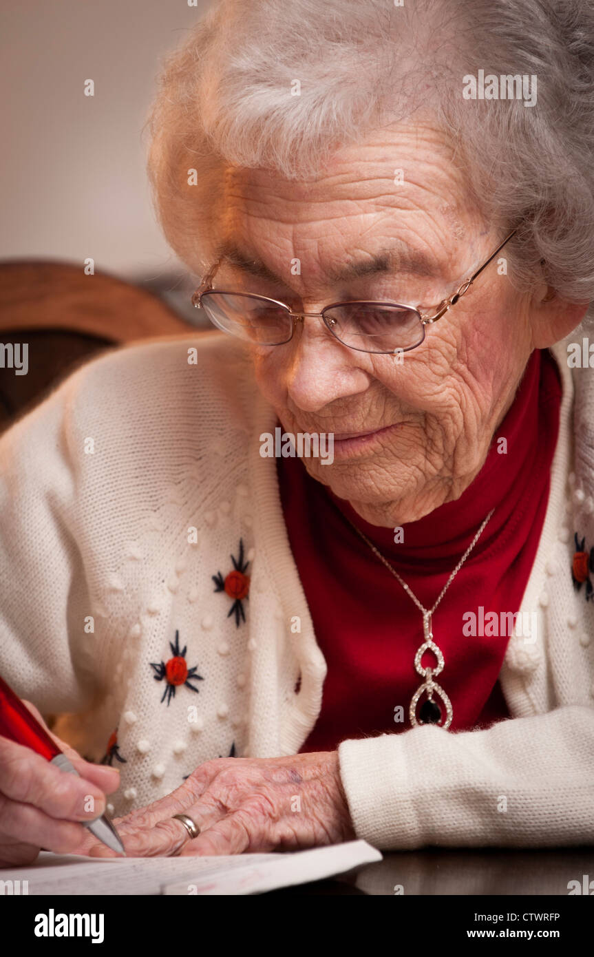 Elderly woman writing letter hi-res stock photography and images - Alamy