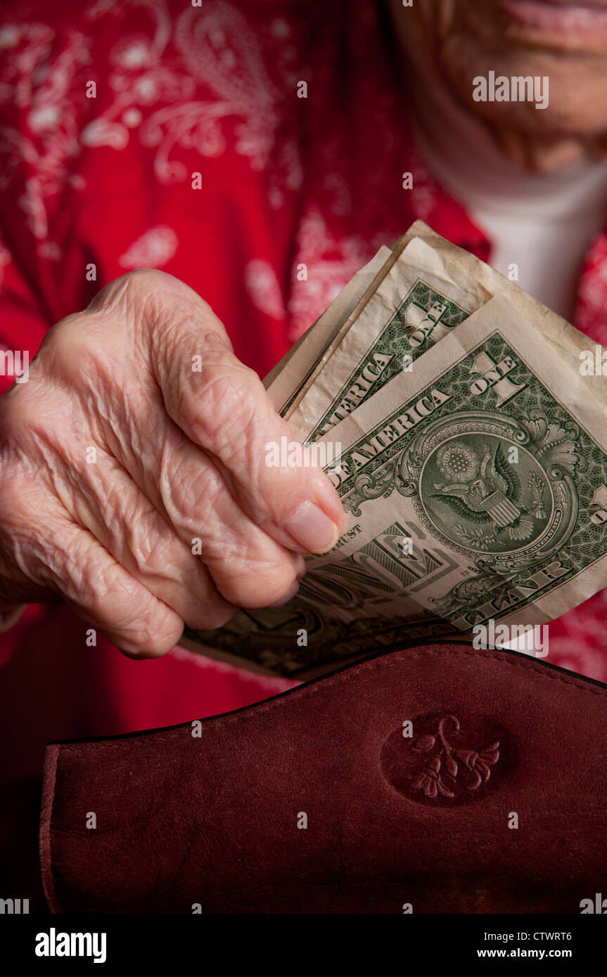 Elderly Lady Counting Money High Resolution Stock Photography and ...