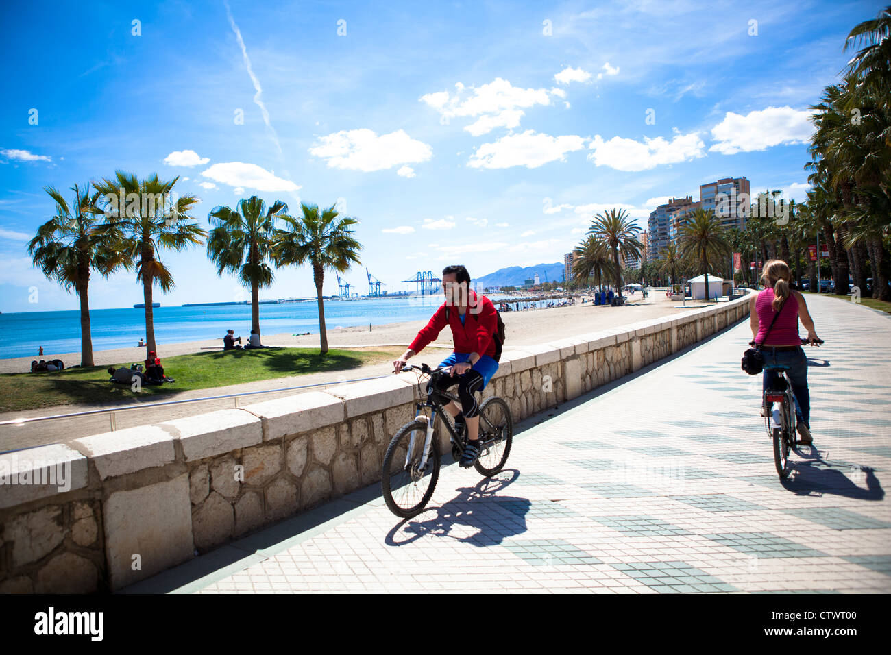 Cycling along the seafront Malaga Spain Stock Photo - Alamy