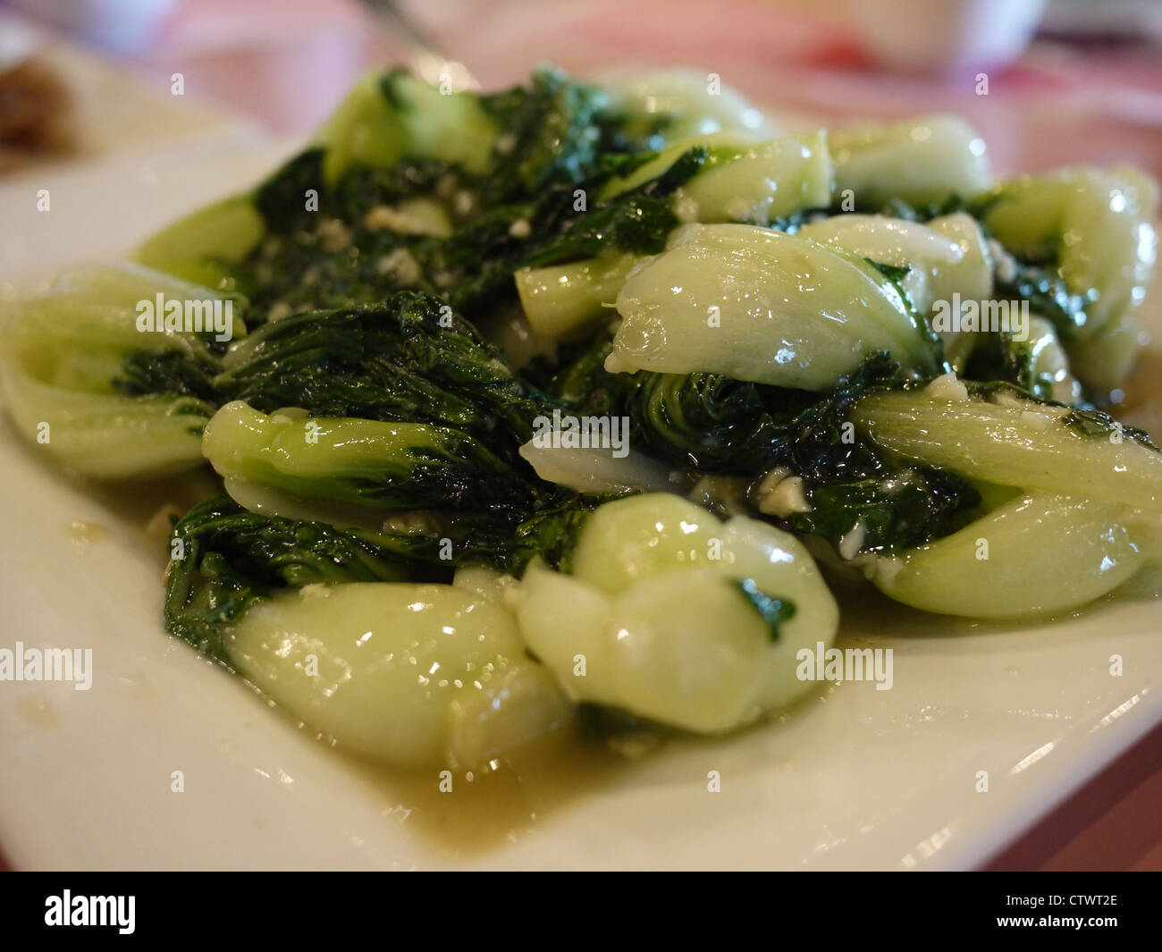 bak choy Chinese vegetable dish garlic source Stock Photo - Alamy