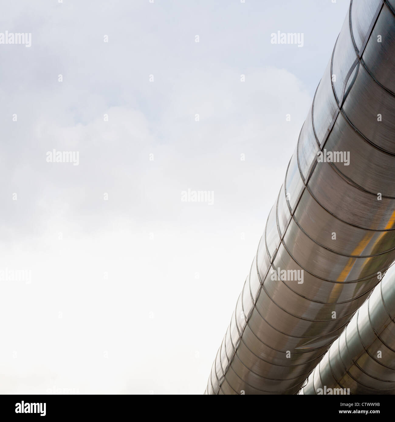 trunk pipeline with grey overcast sky Stock Photo - Alamy